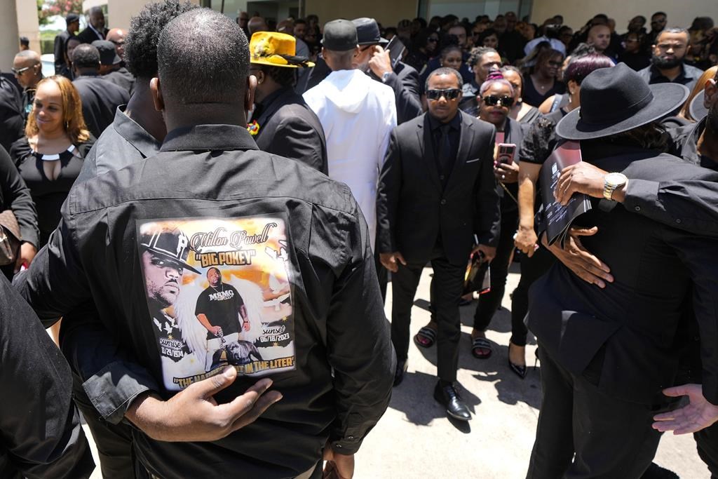Friends and family gather for the funeral of Houston rapper Big Pokey