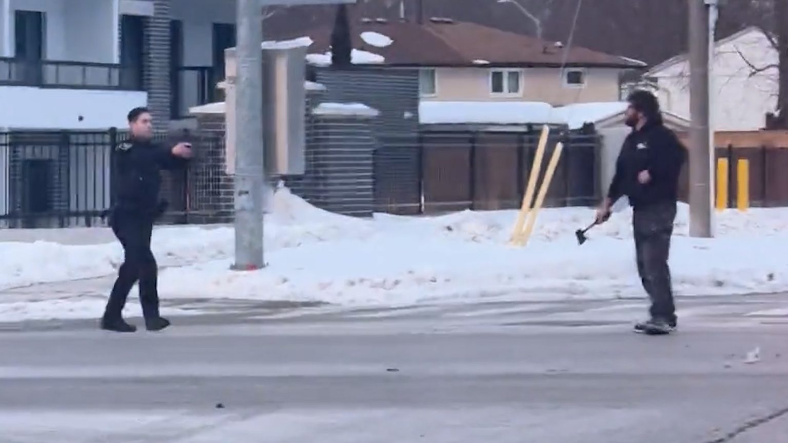 Police chief reacts to axe-wielding suspect and officer interaction