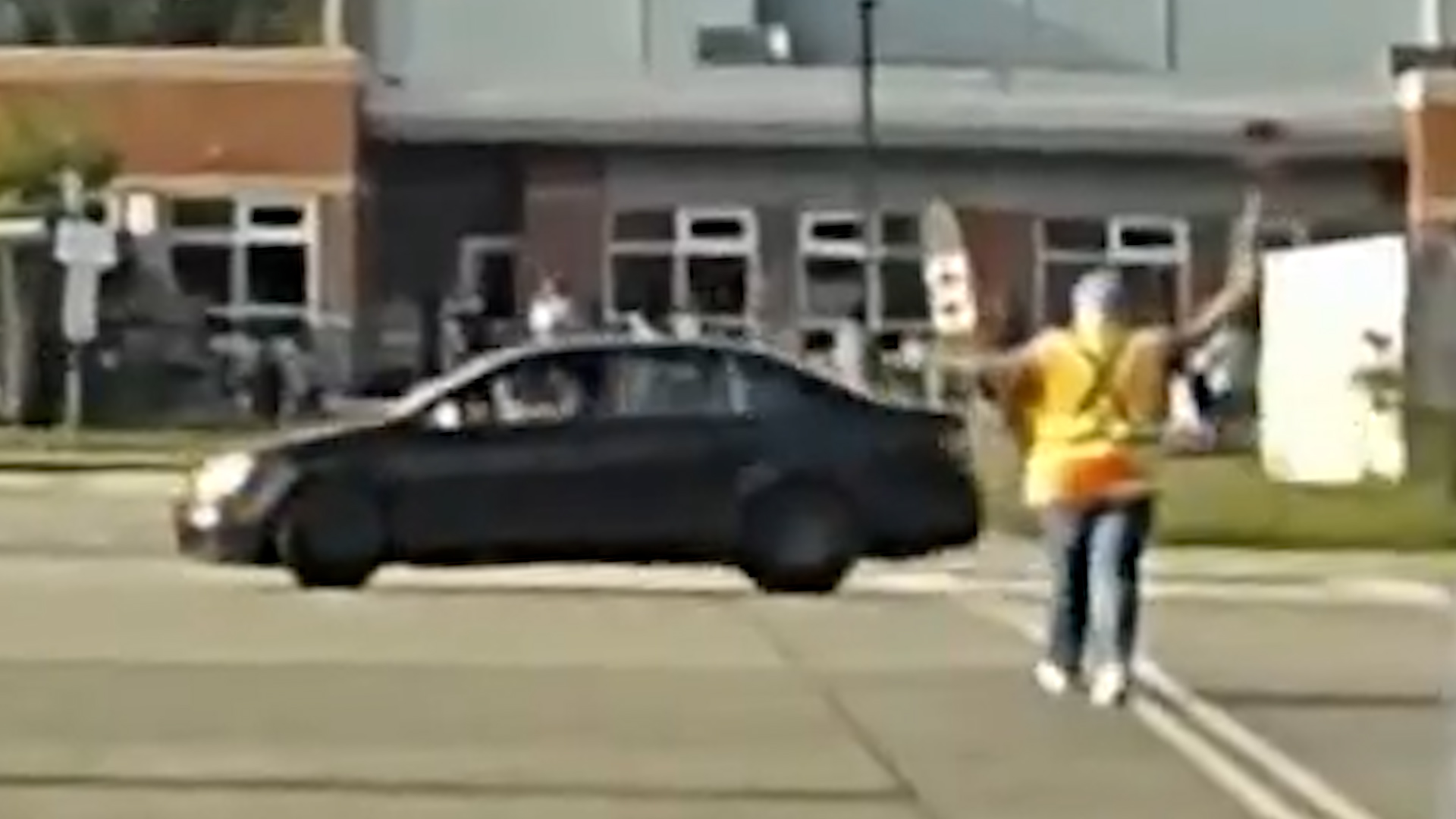 Driver fined after disobeying crossing guard while giving the finger