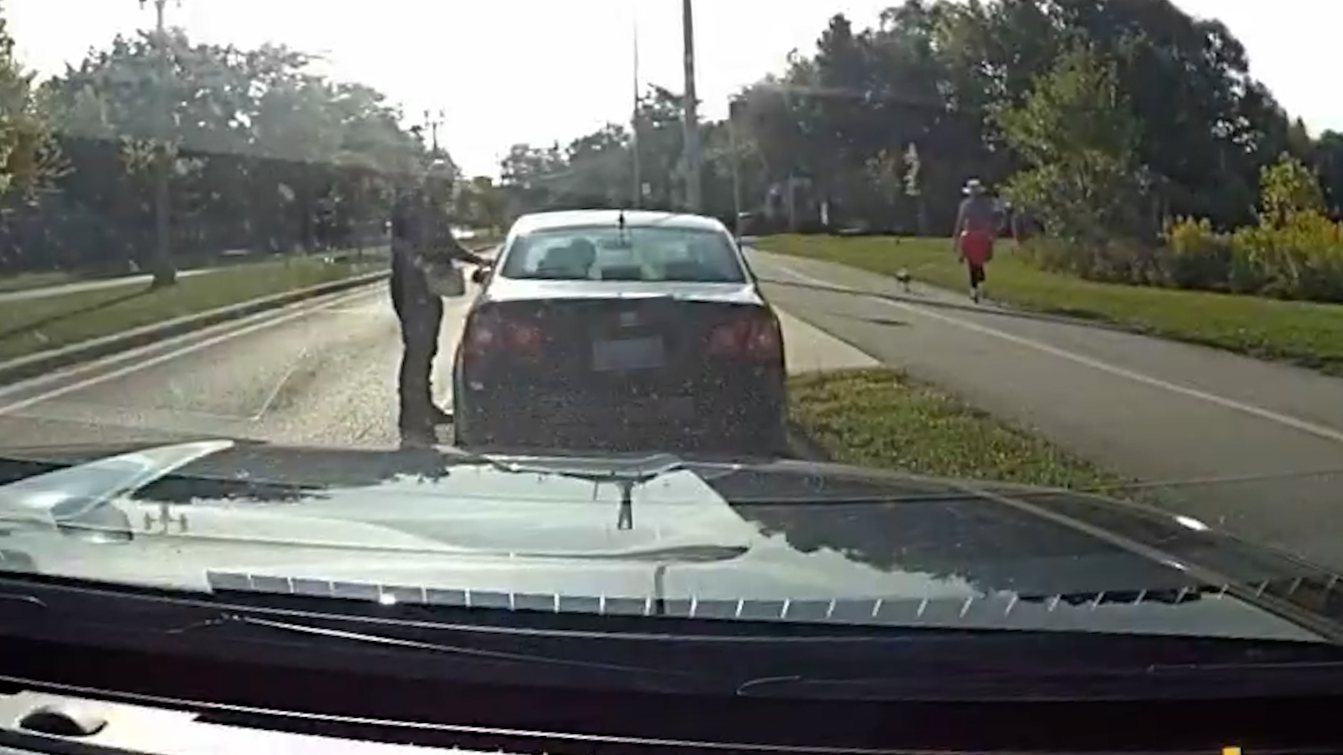 Driver fined after disobeying crossing guard while giving the finger