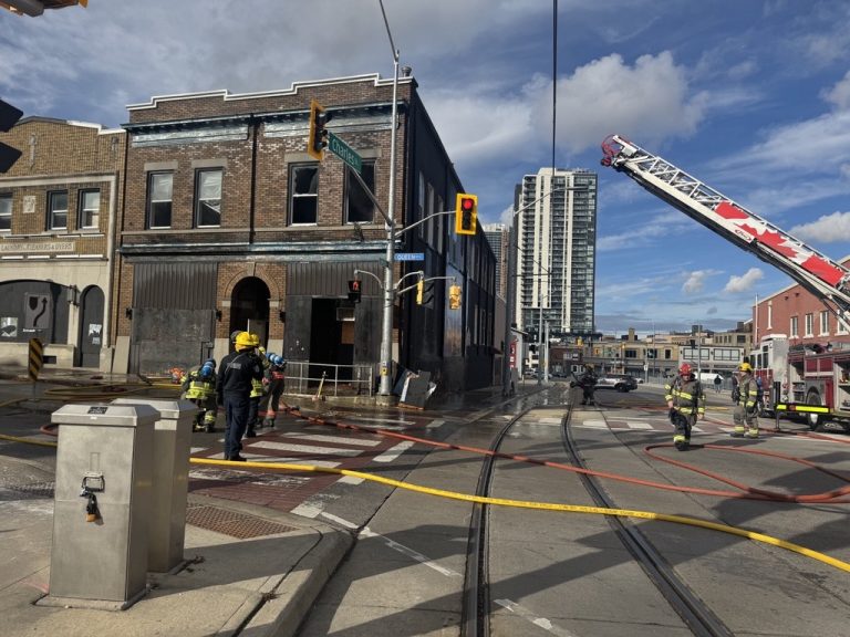 Crews battle fire in downtown Kitchener that paused LRT service briefly