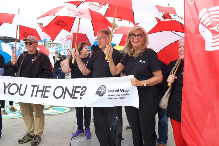 Community members walk from Waterloo Public Square to Carl Zehr Square ...