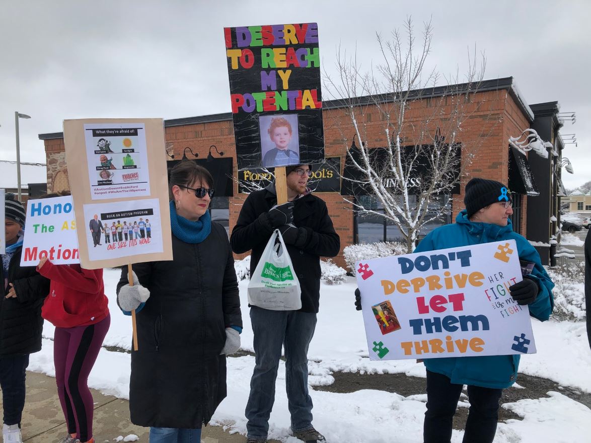 Local protesters of autism changes rally in support of march in Ottawa